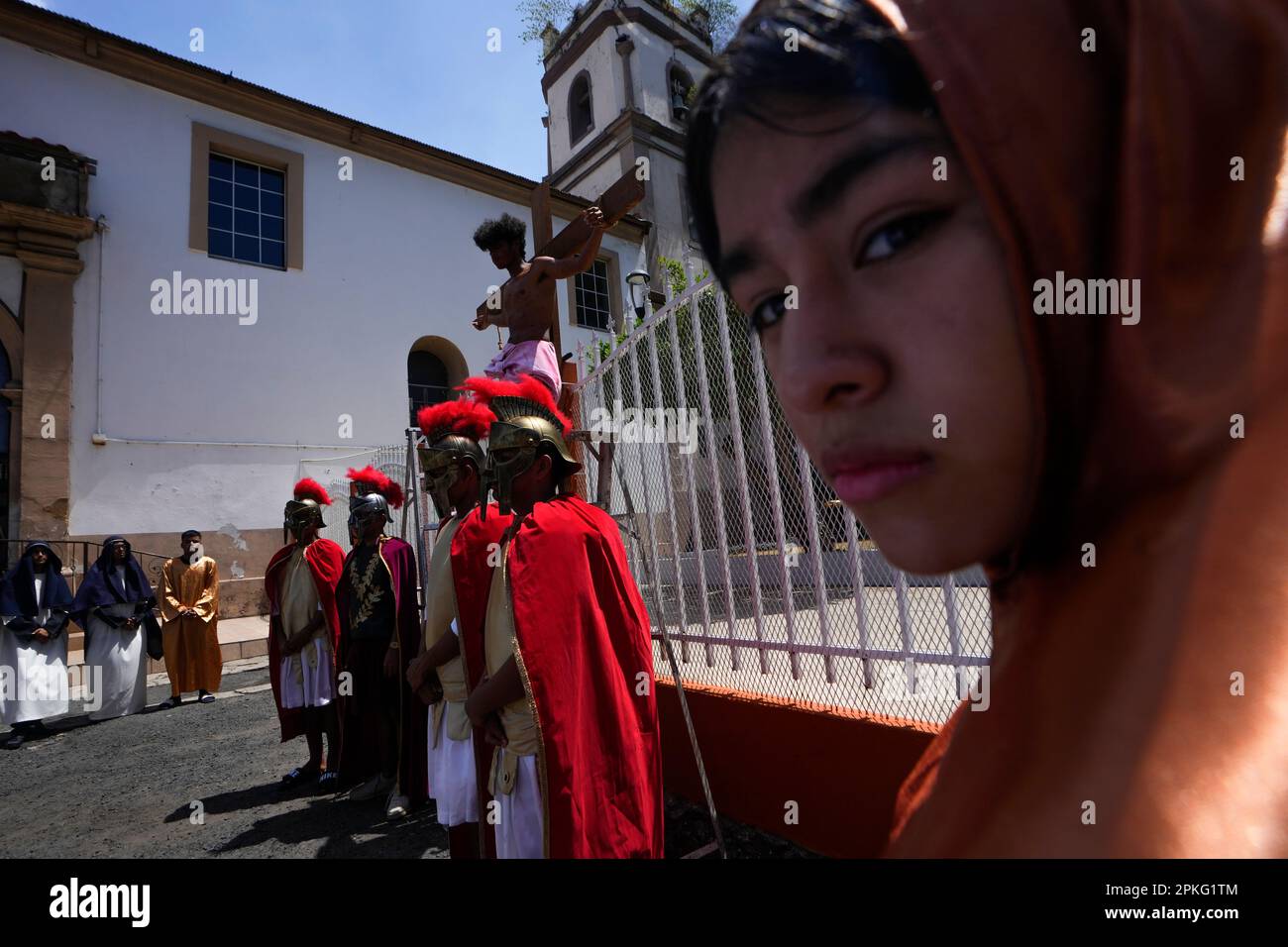Faithful take part in a Way of the Cross reenactment, marking Good ...