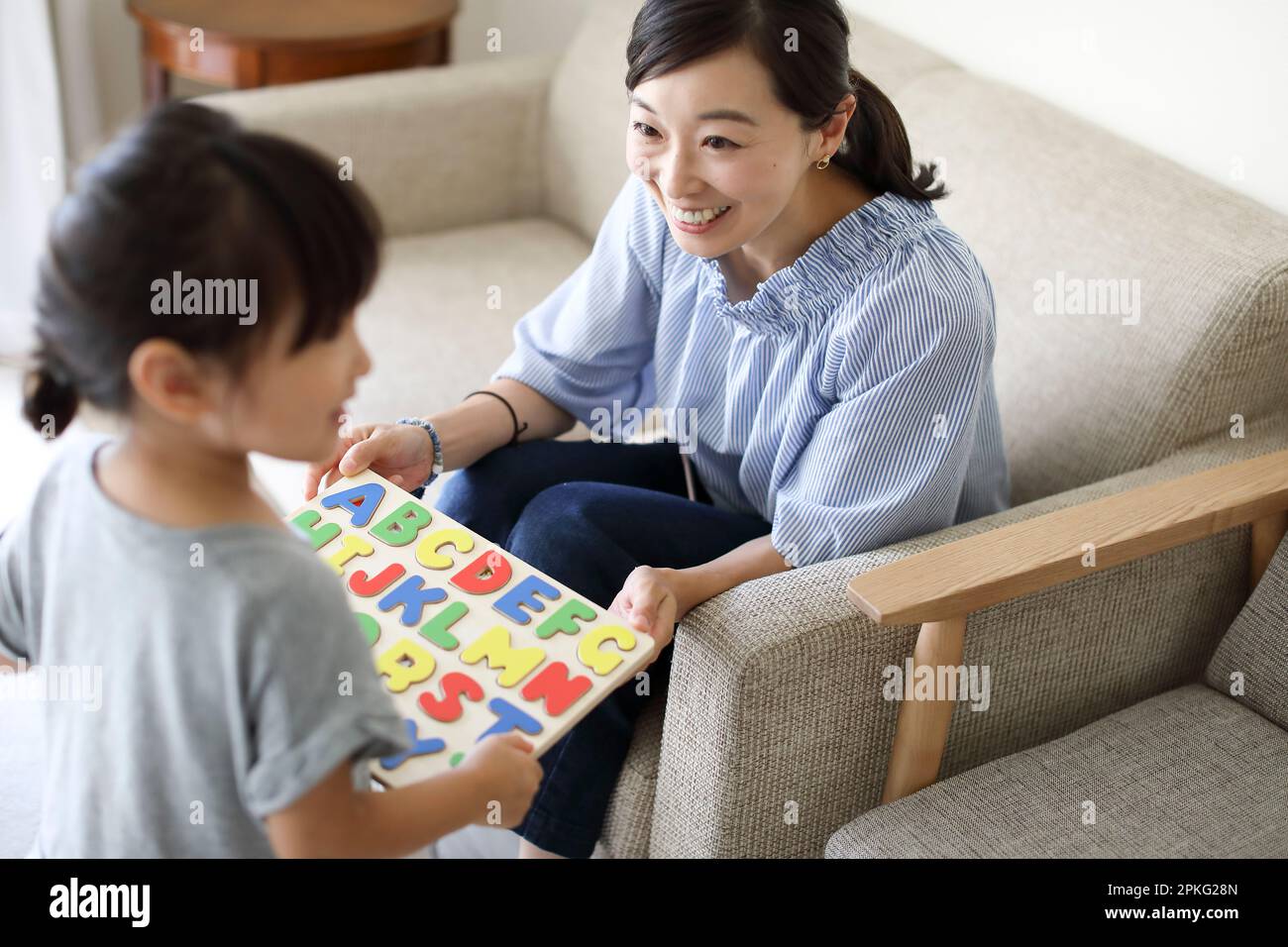 Asian showing hi-res stock photography and images - Alamy