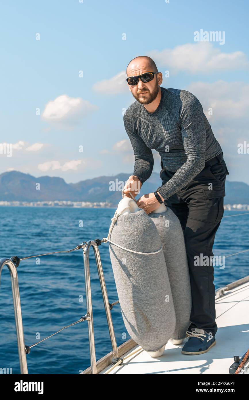 Voyage race sail on professional sport sea yacht. Mooring fender ...