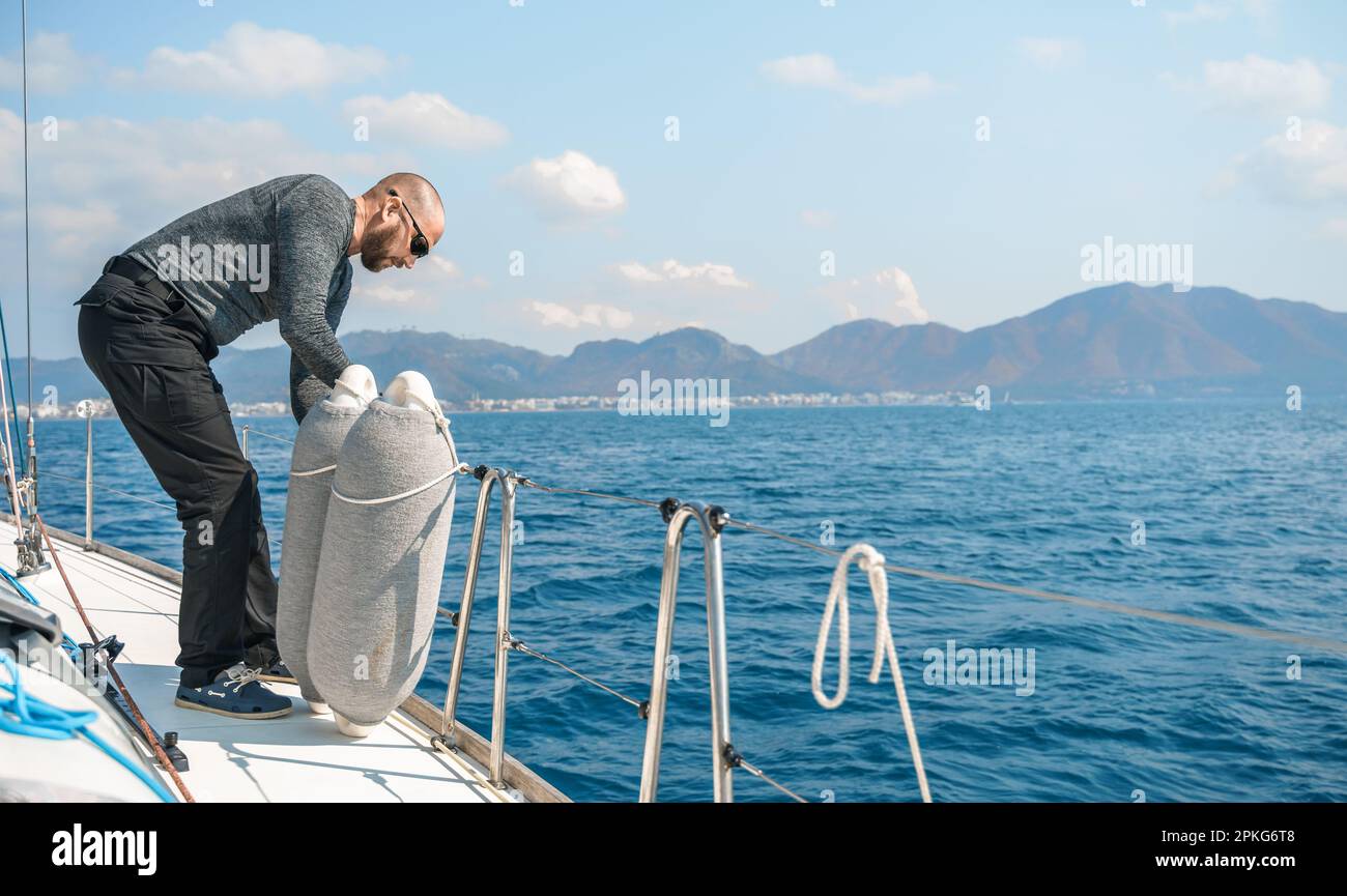 Voyage race sail on professional sport sea yacht. Mooring fender ...