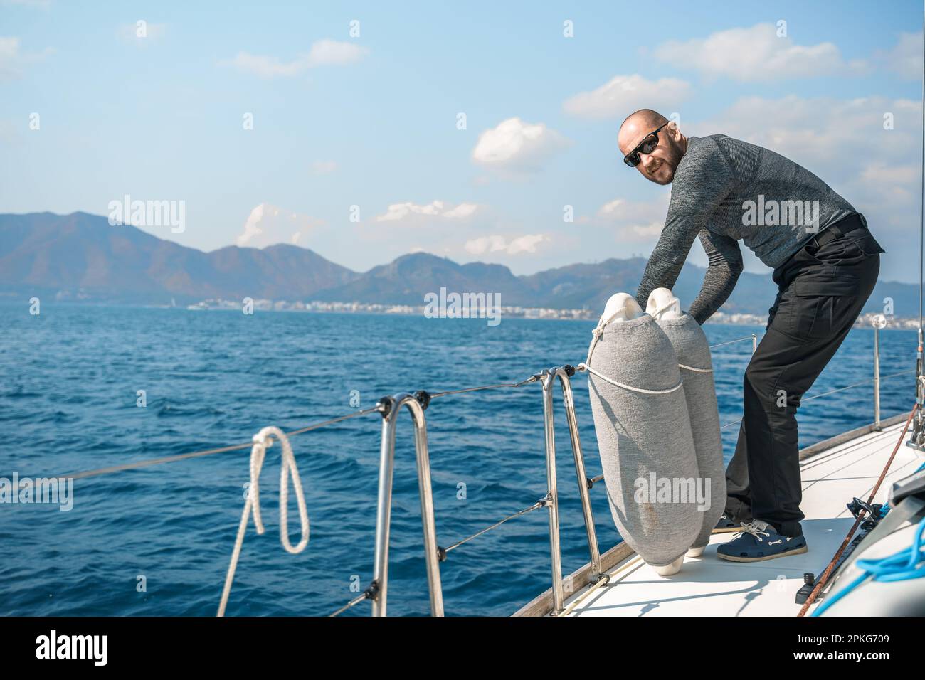 Voyage race sail on professional sport sea yacht. Mooring fender ...