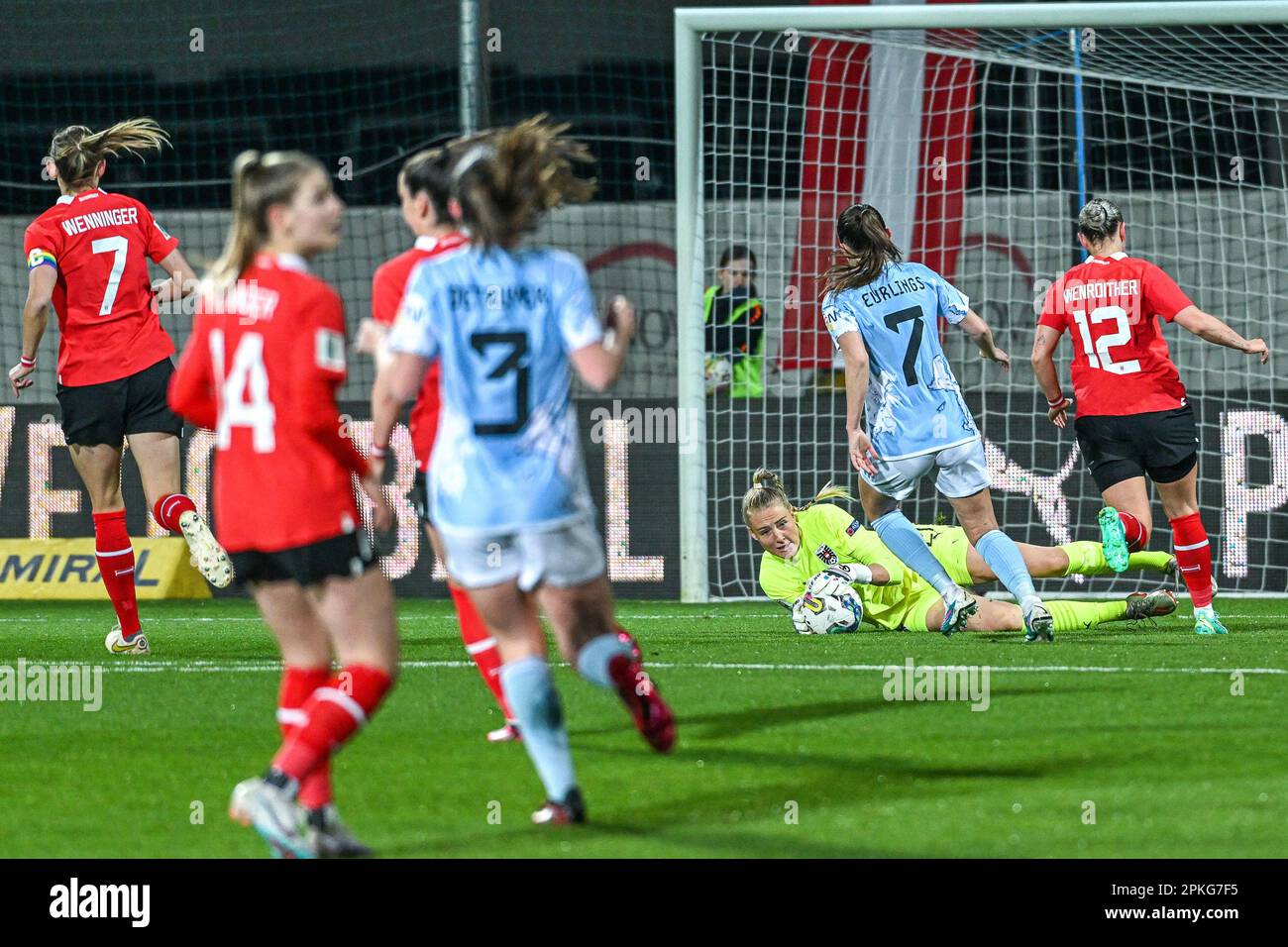 Hannah Eurlings and goalkeeper Isabella Kresche (21) of Austria pictured during a friendly ...