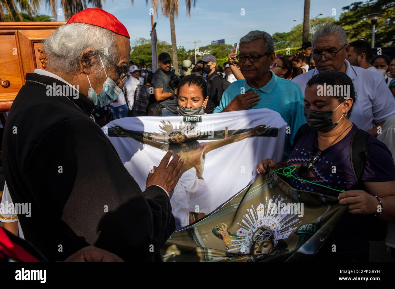 Cardinal Leopoldo Brenes blesses religious banners during an event ...