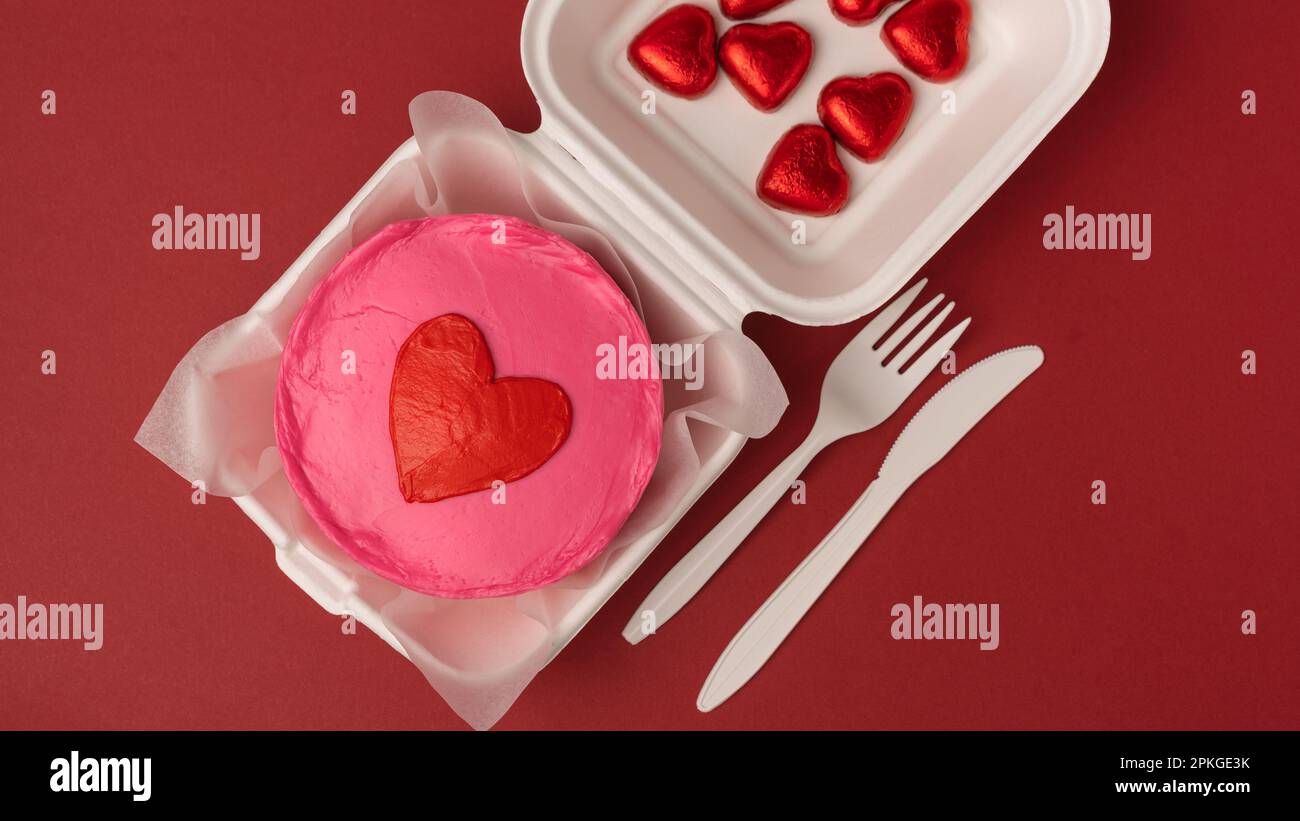 Valentine day bento cake In box on the red background Stock Photo - Alamy