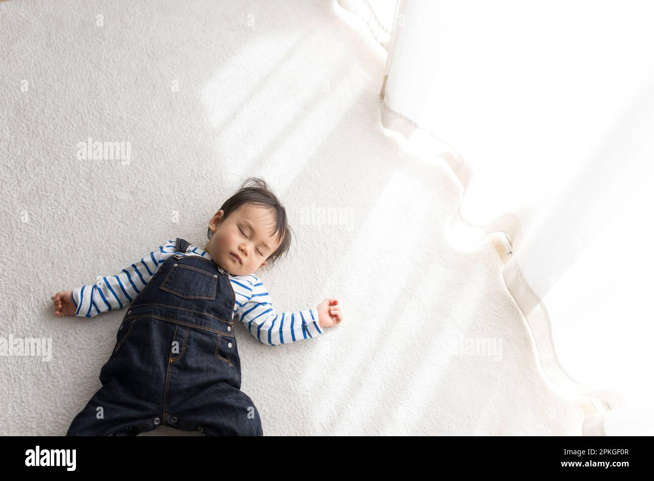 Baby taking a nap Stock Photo - Alamy
