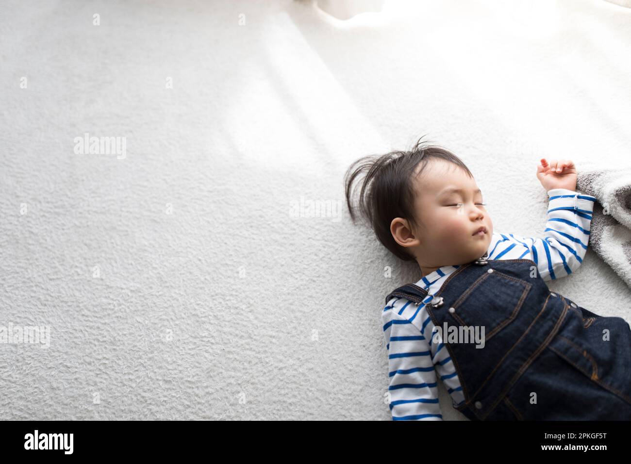 Baby boy napping hi-res stock photography and images - Alamy
