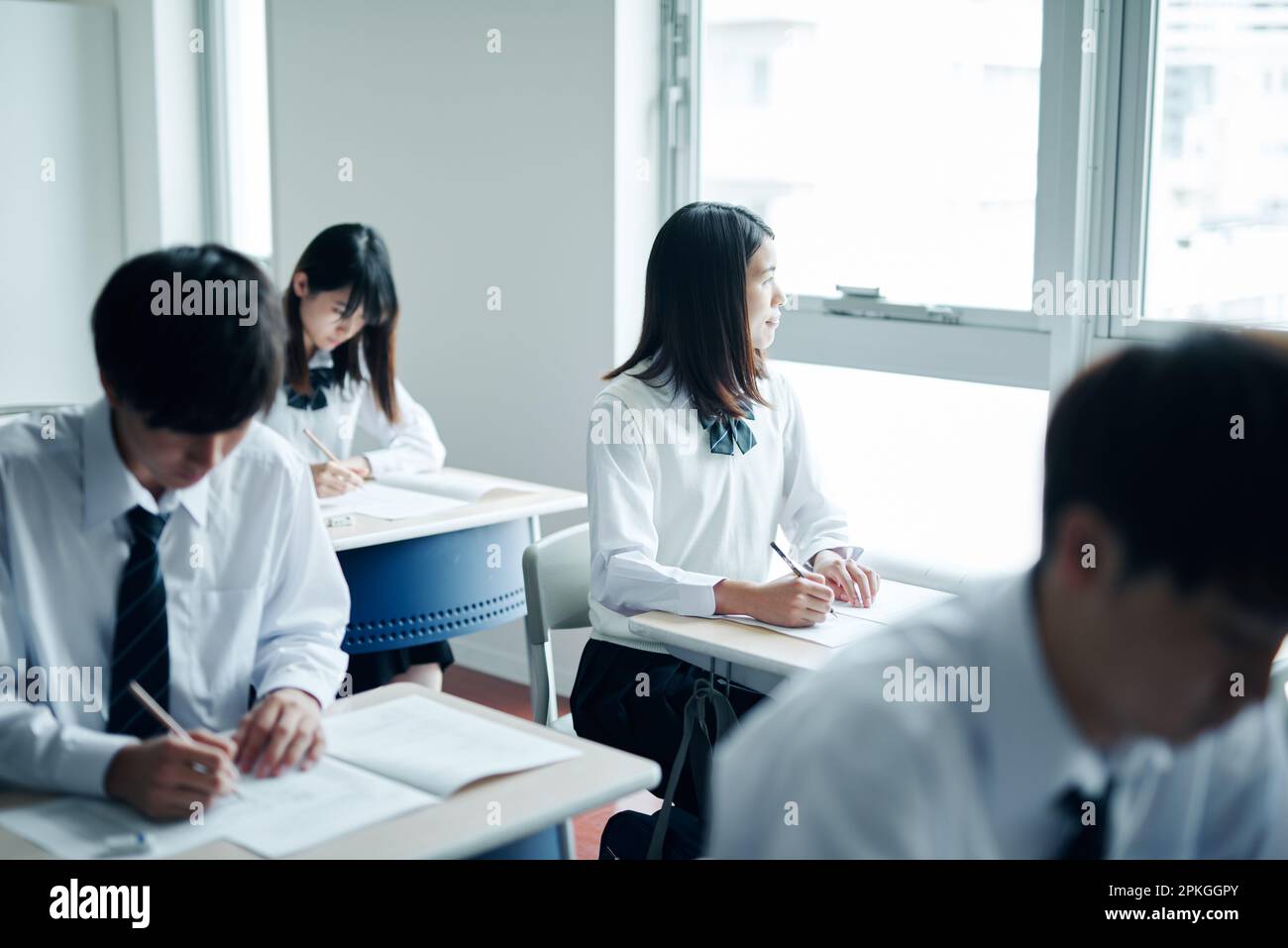 Female high school students taking a class in a classroom Stock Photo ...