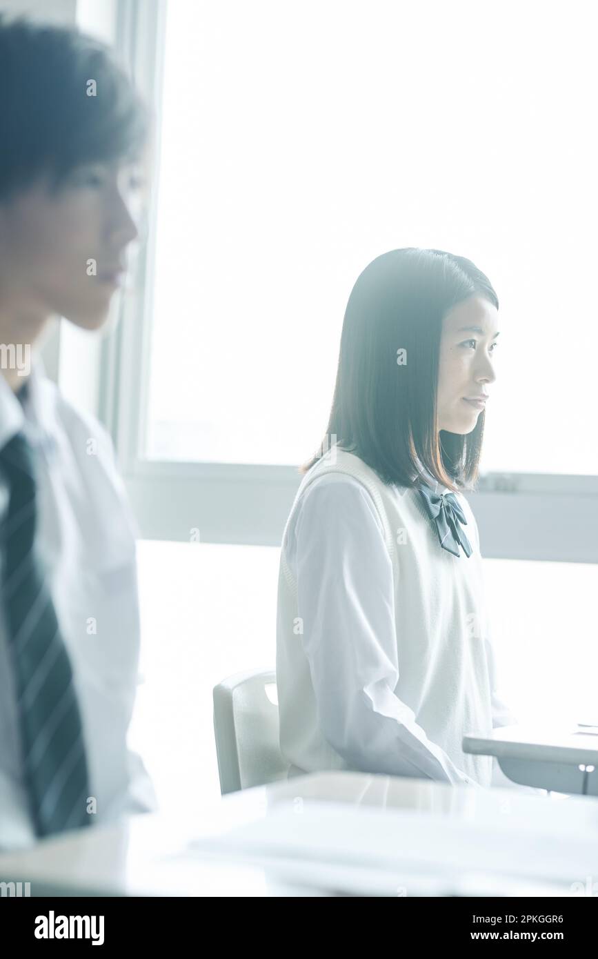 Female high school students taking a class in a classroom Stock Photo ...