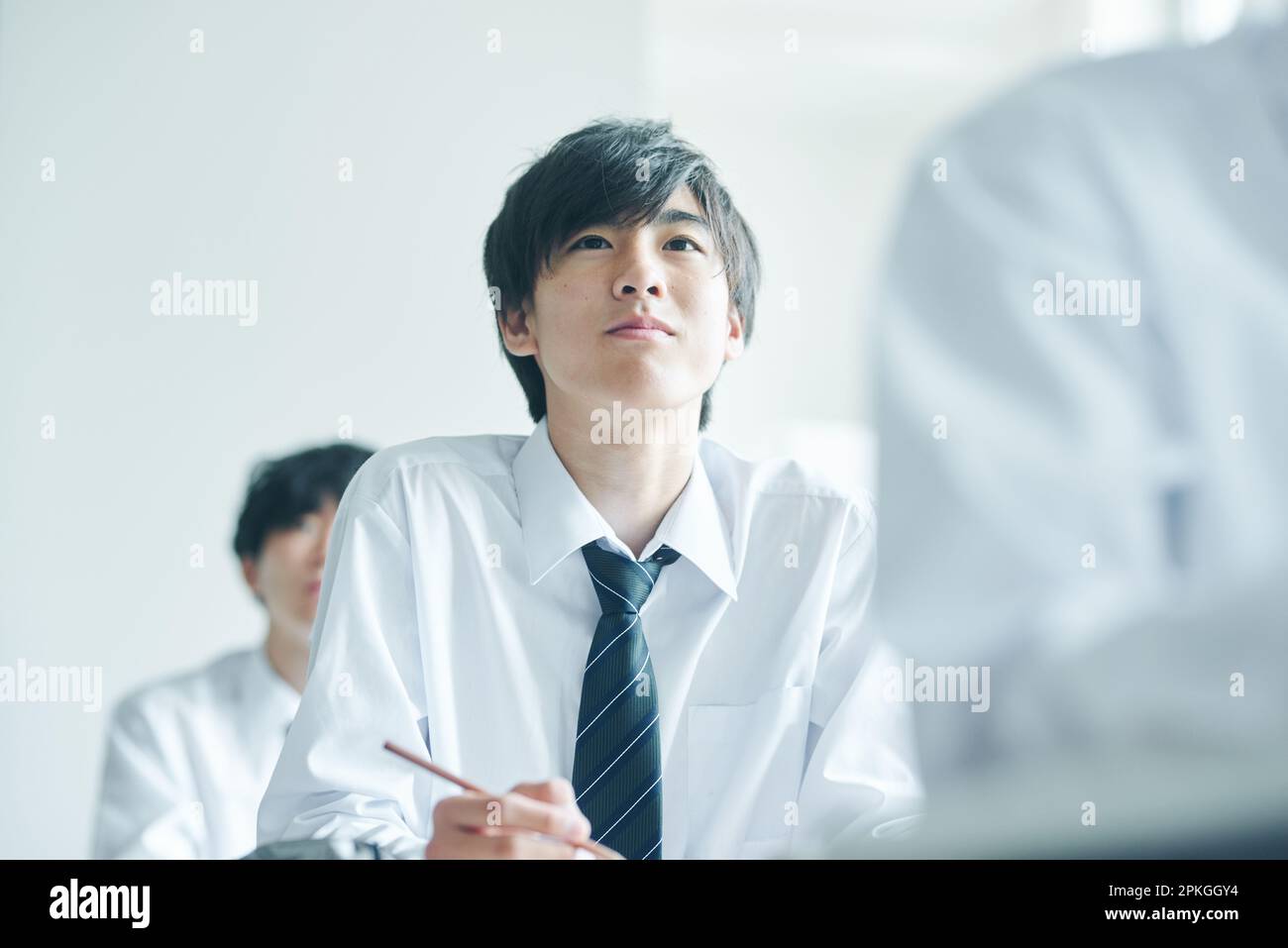 A male high school student taking a class in a classroom Stock Photo ...