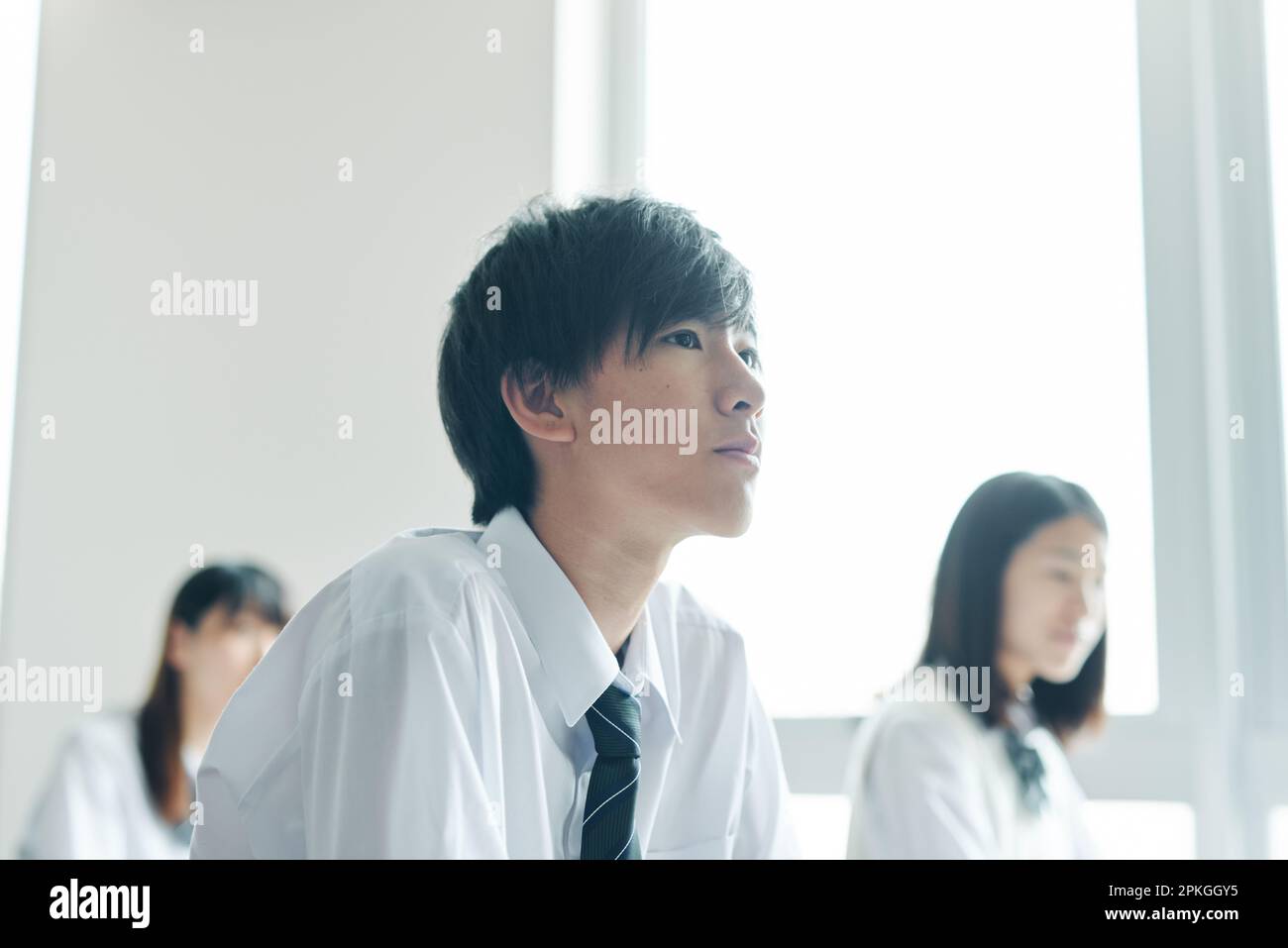 A male high school student taking a class in a classroom Stock Photo ...