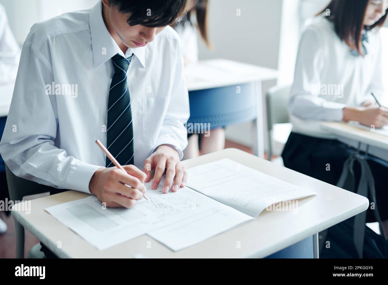 High school students taking a mock exam in the classroom Stock Photo ...