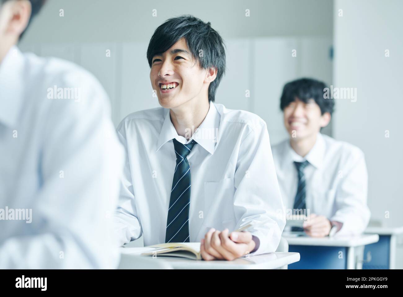 A male high school student taking a class in a classroom Stock Photo ...
