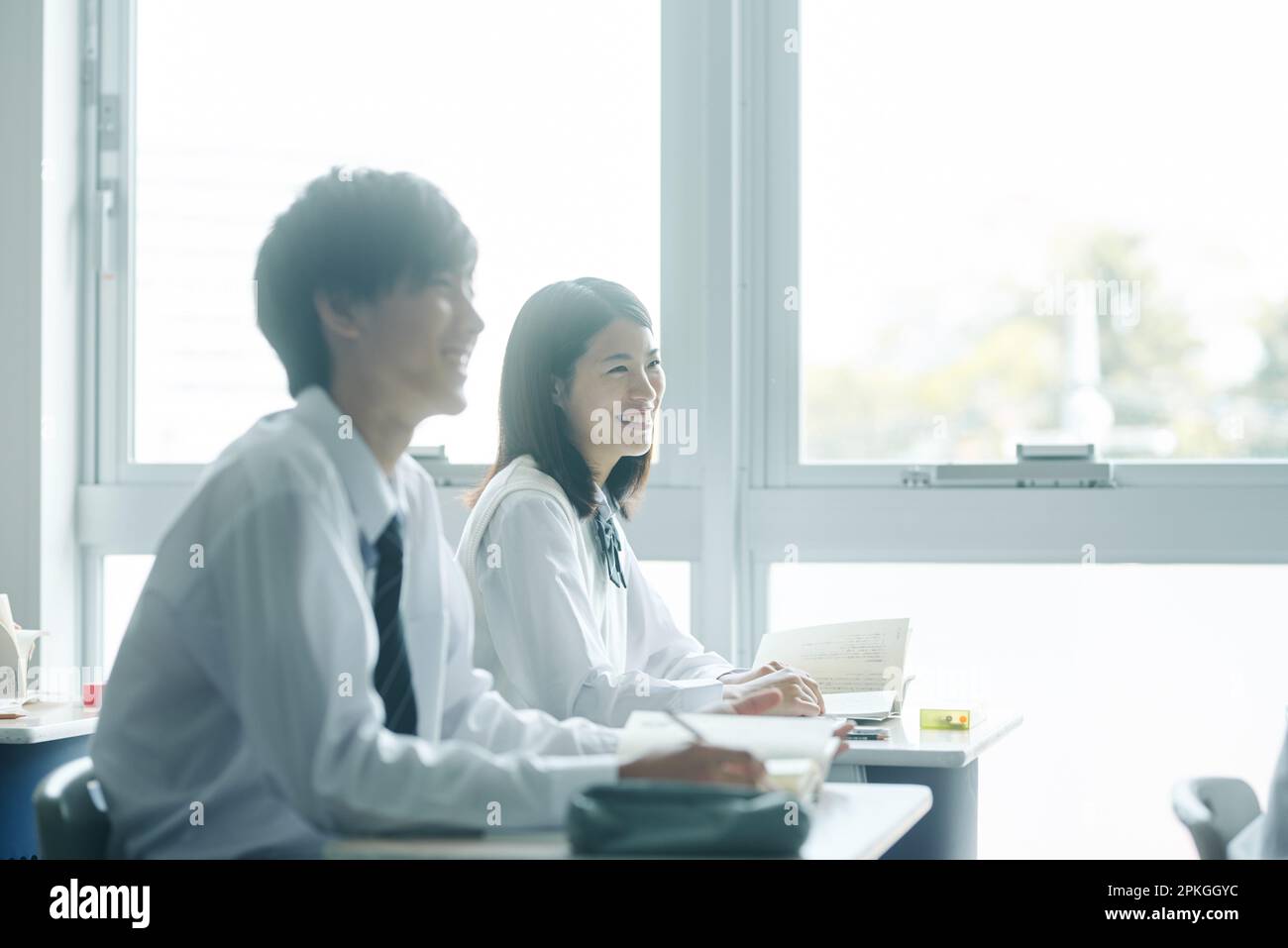 A high school girl taking a class in a classroom Stock Photo - Alamy