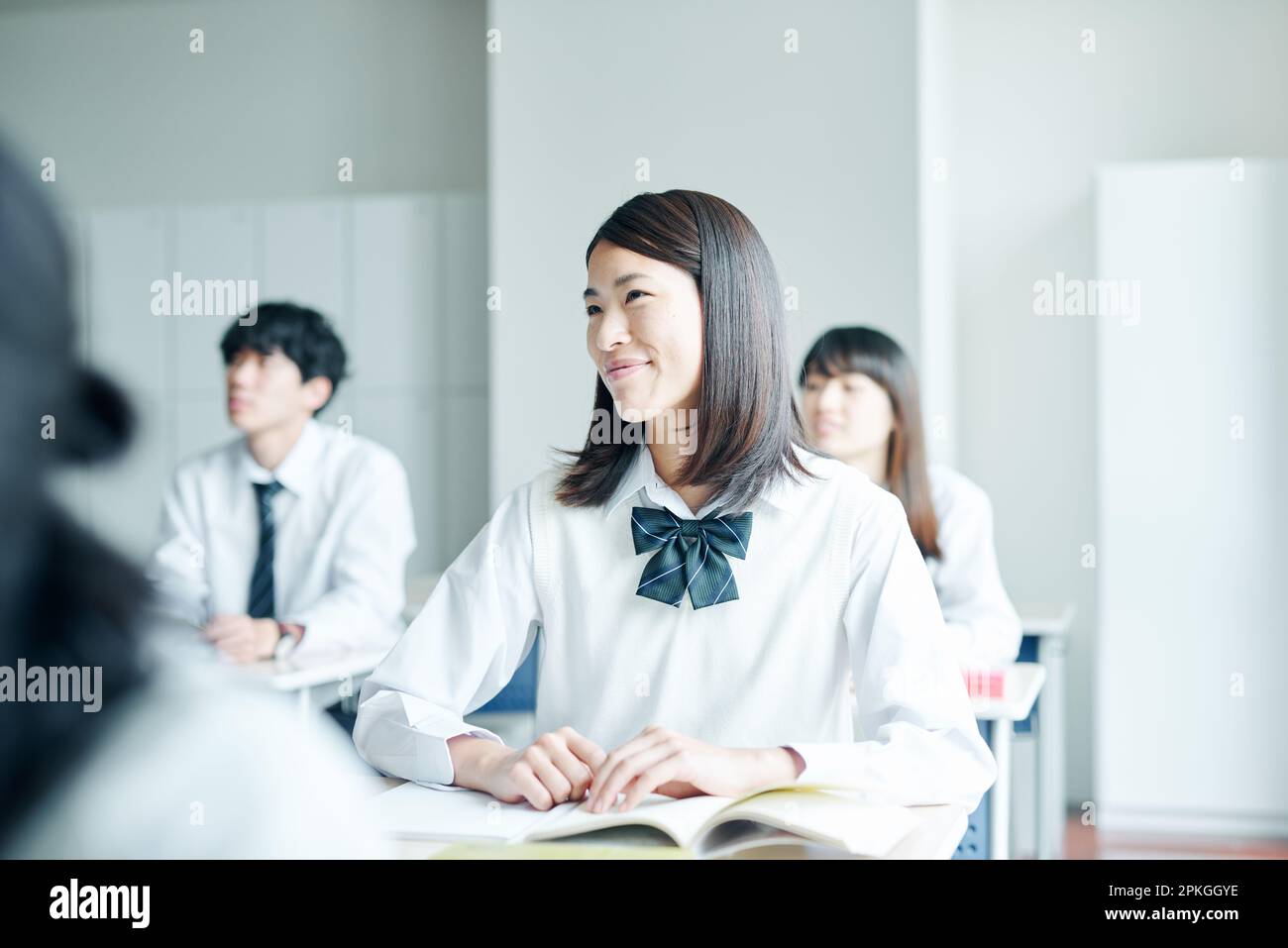 Female high school student taking a class in a classroom Stock Photo ...