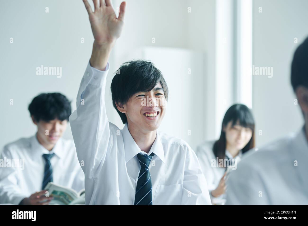A male high school student taking a class in a classroom Stock Photo ...