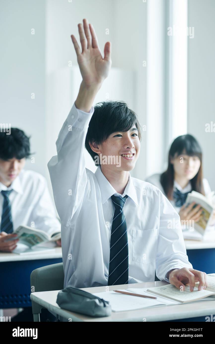 A male high school student taking a class in a classroom Stock Photo ...