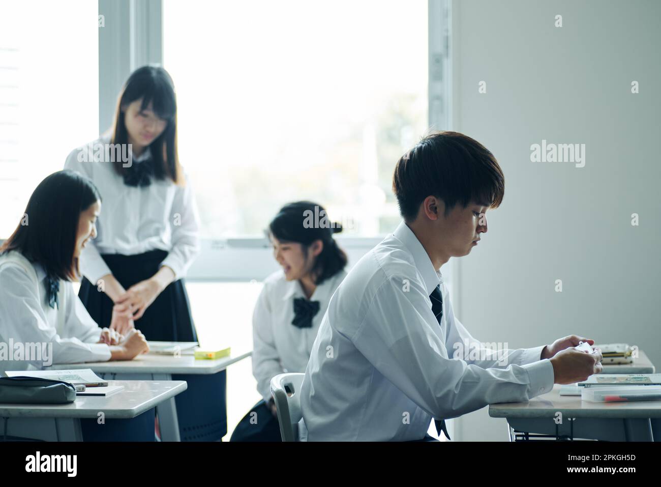 High school students spending recess in a classroom Stock Photo - Alamy