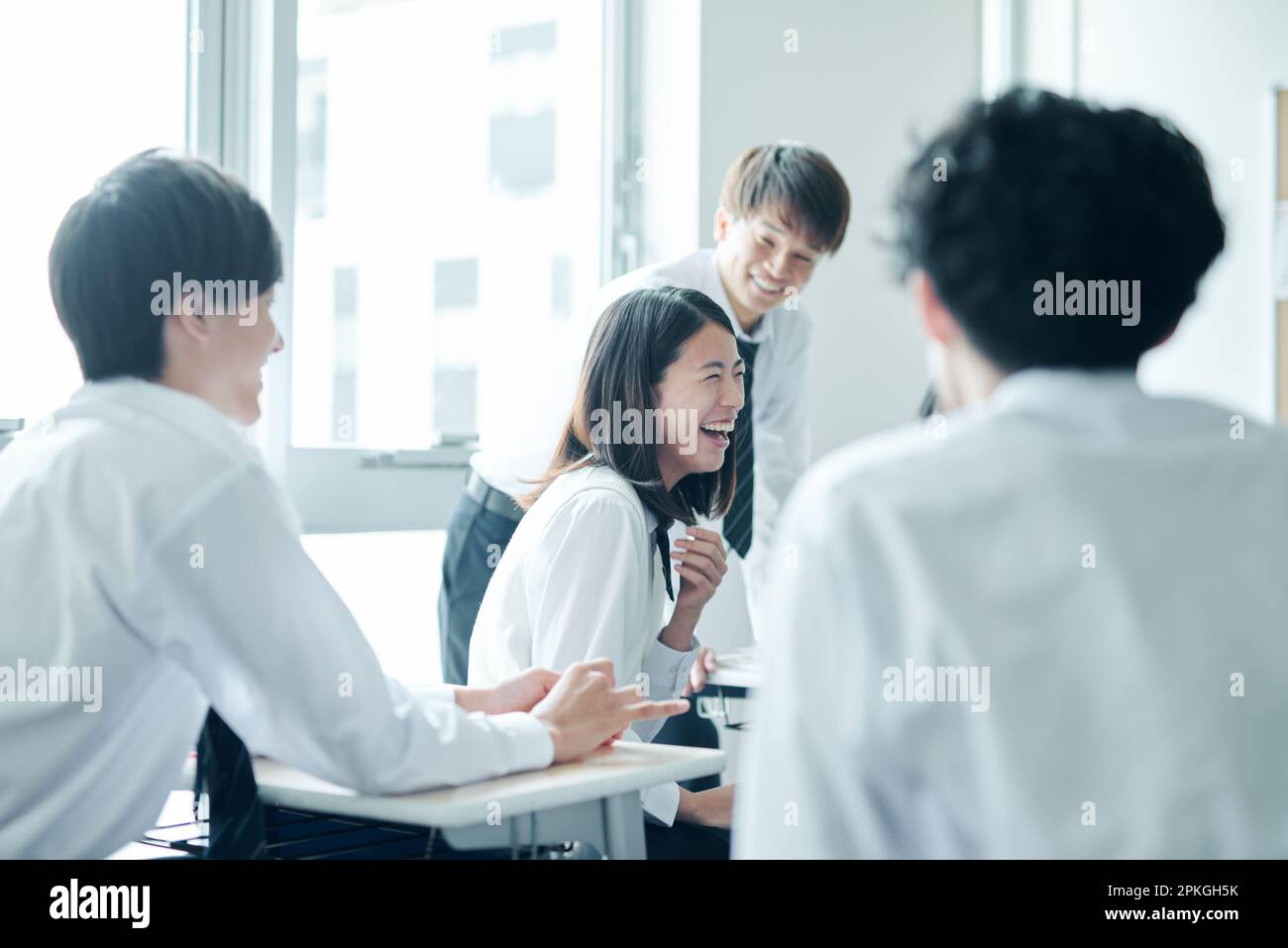 High school students chatting in the classroom Stock Photo - Alamy