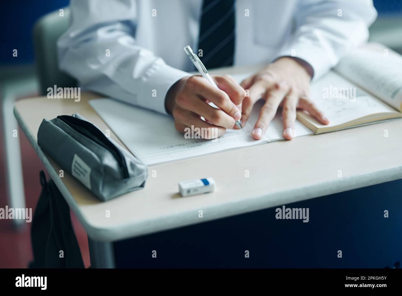 A high school student taking a mock test in a classroom Stock Photo - Alamy