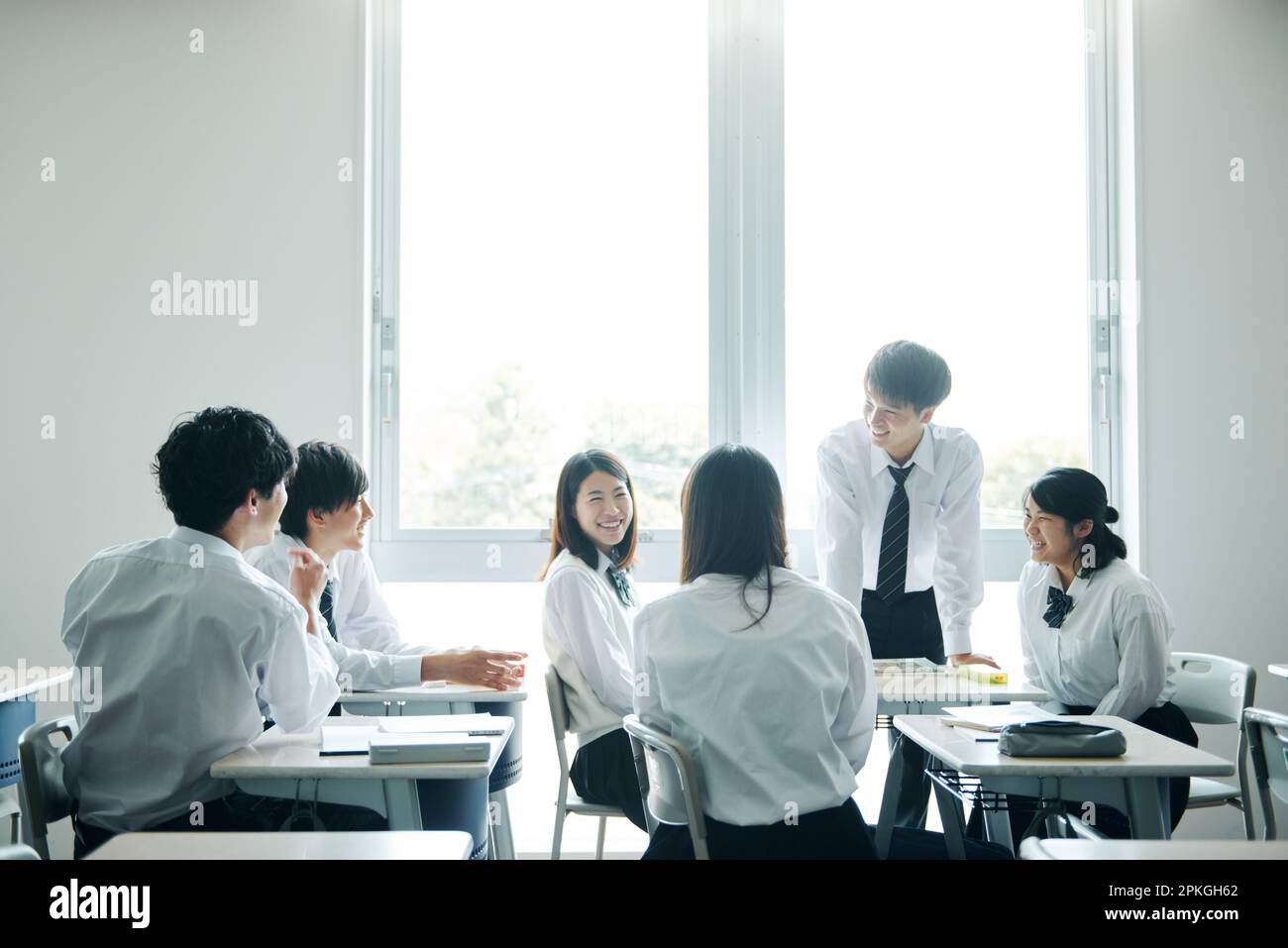 High school students chatting in a classroom during recess Stock Photo ...