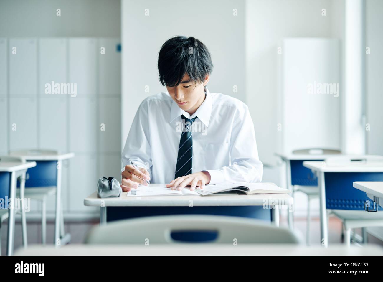 High school boys taking a mock exam in the classroom Stock Photo - Alamy