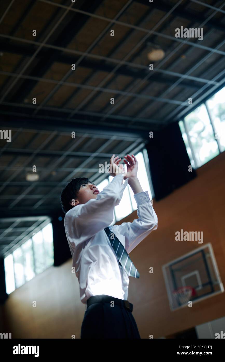 High school boys playing basketball after school Stock Photo - Alamy