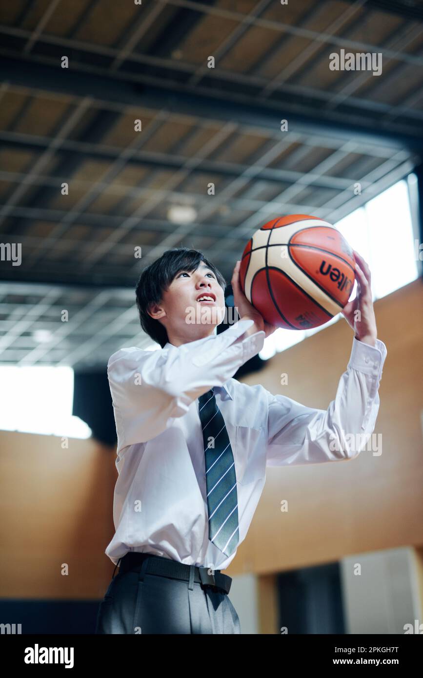 High school boys playing basketball after school Stock Photo - Alamy