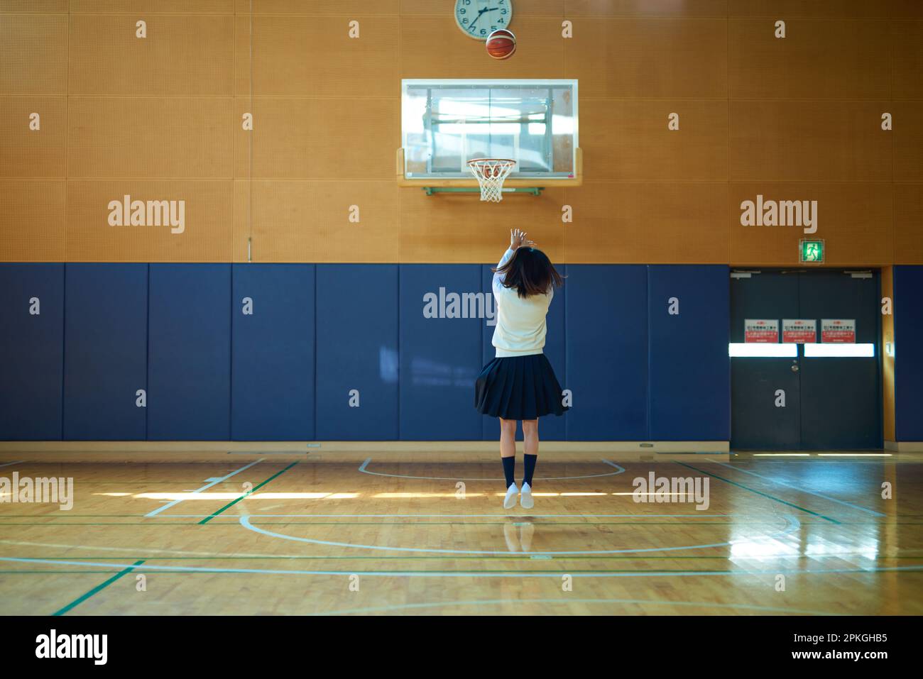 High school girls playing basketball in the gym Stock Photo - Alamy