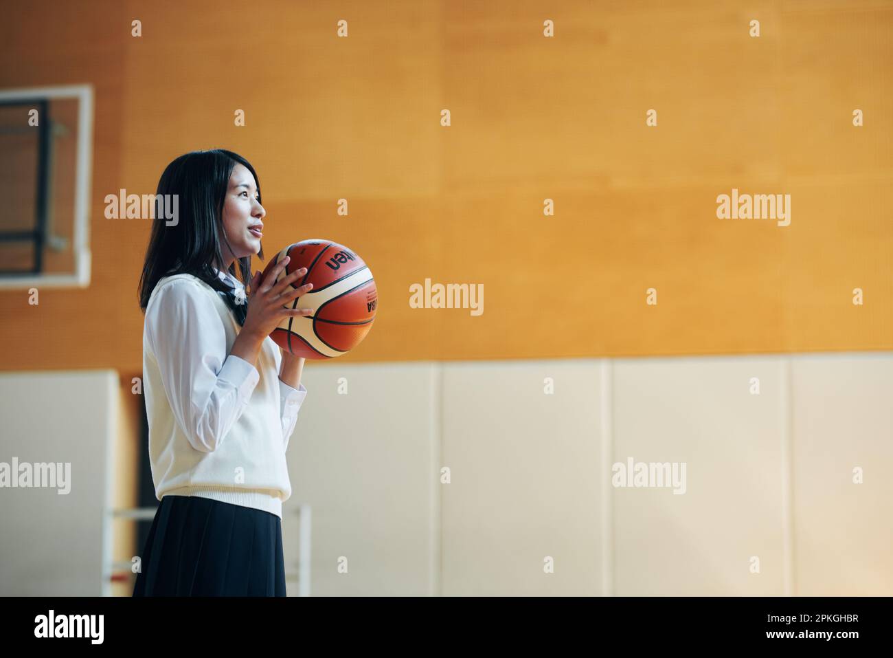 High school girls playing basketball in the gym Stock Photo - Alamy
