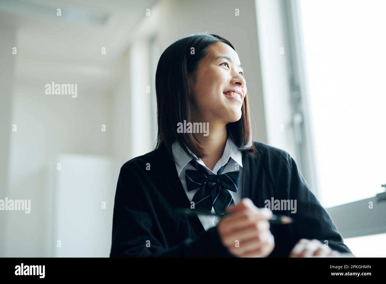 High school girls studying in a classroom Stock Photo - Alamy