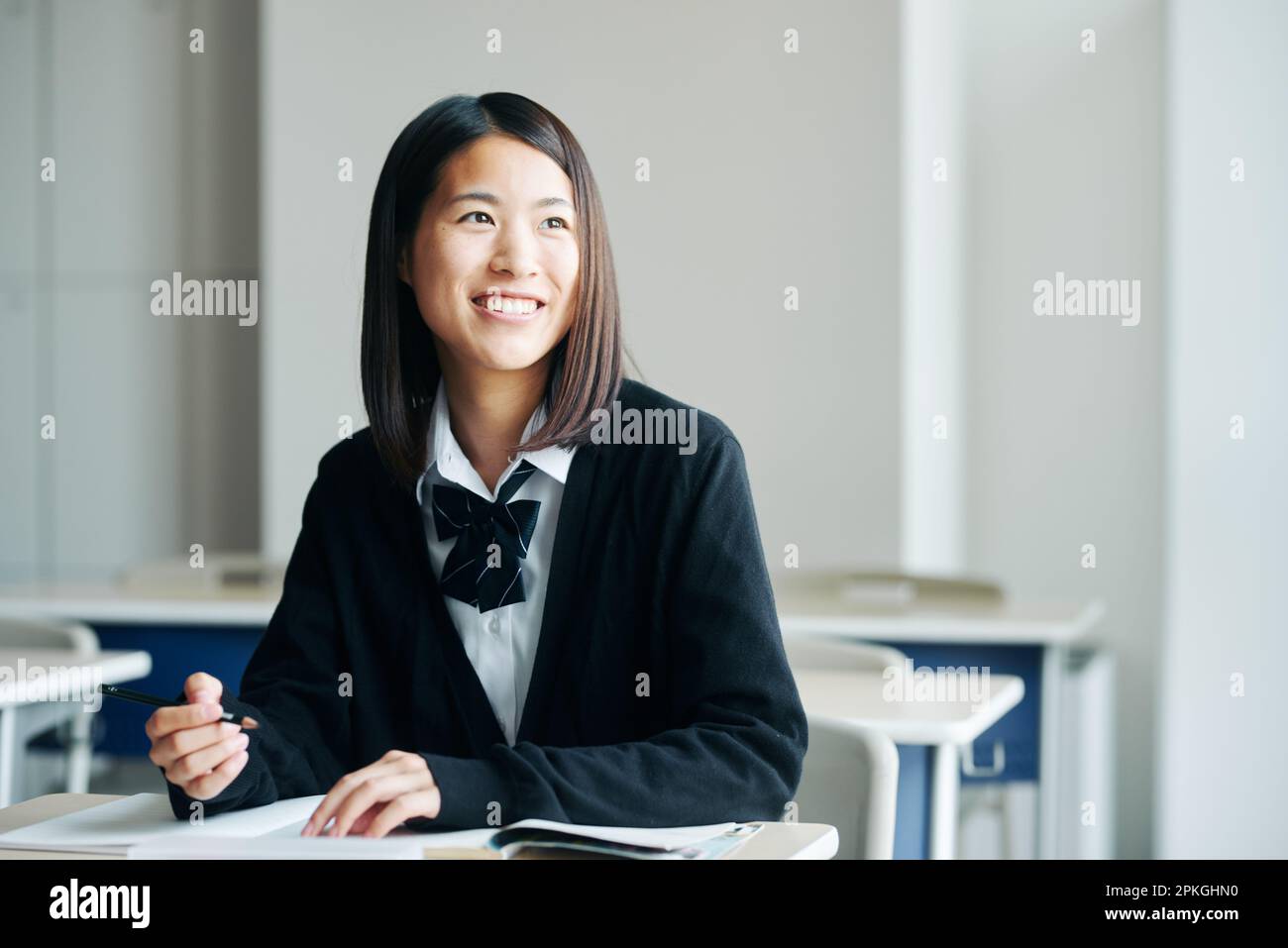 High school girls studying in a classroom Stock Photo - Alamy