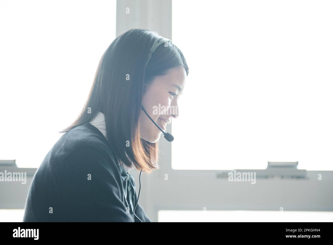 High school girls operating a computer in a classroom Stock Photo - Alamy