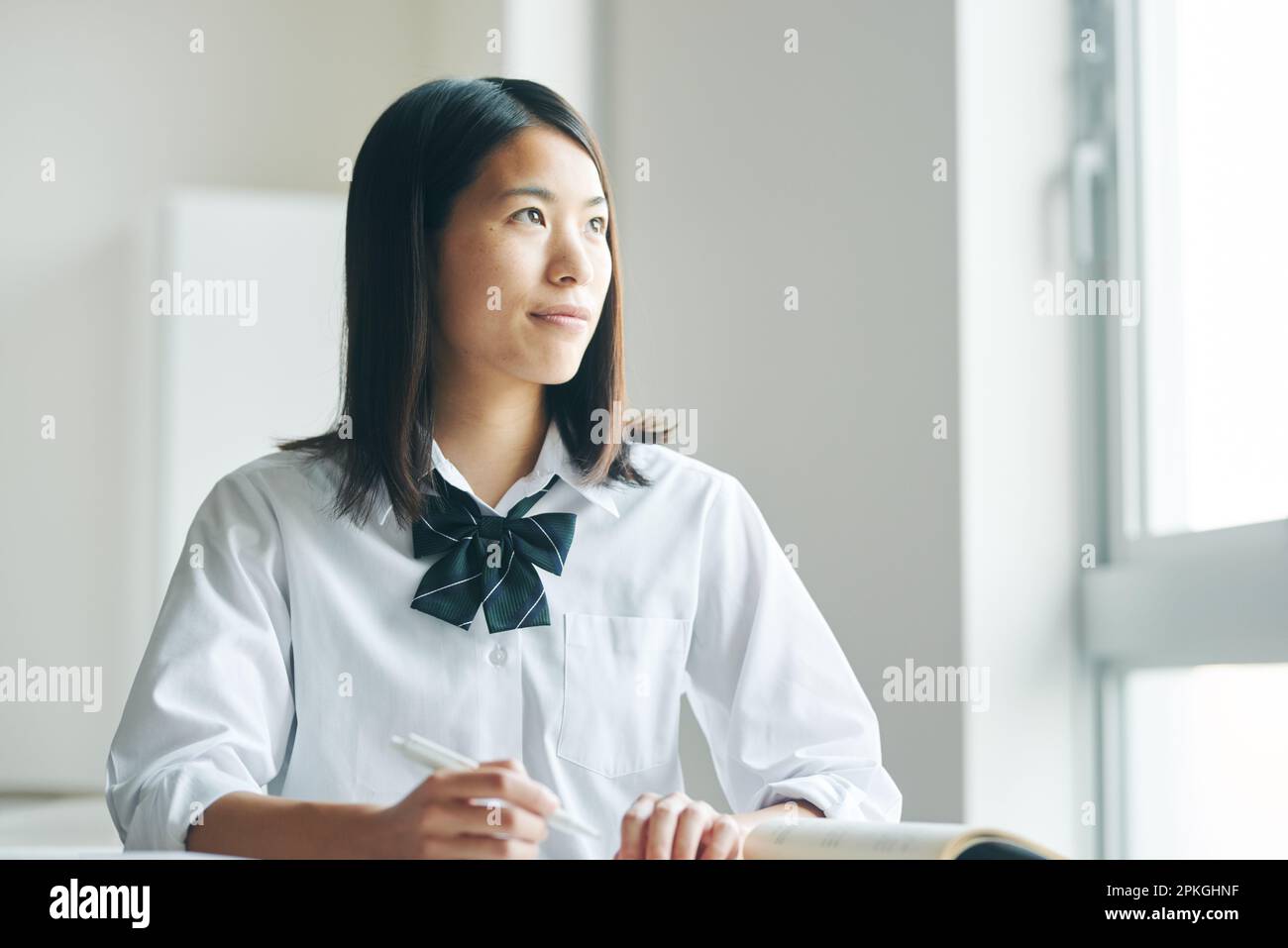 High school girls studying in a classroom Stock Photo - Alamy