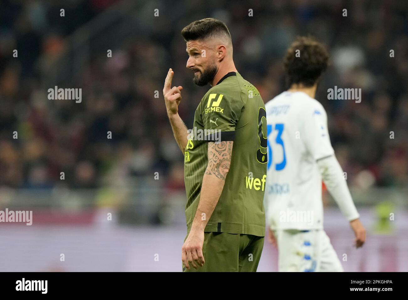 AC Milan's Olivier Giroud gestures during the Serie A soccer match ...