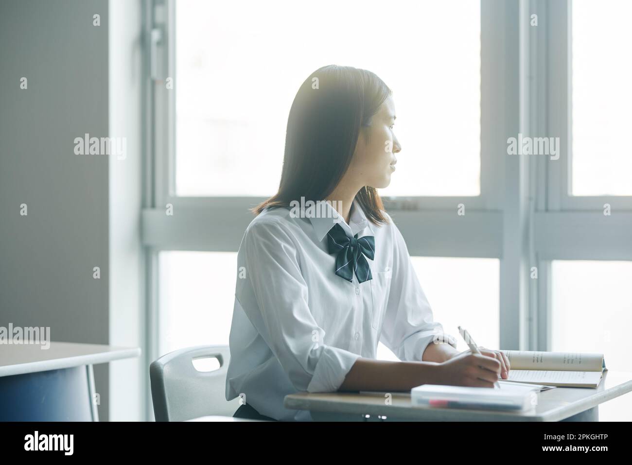 High school girls studying in a classroom Stock Photo - Alamy