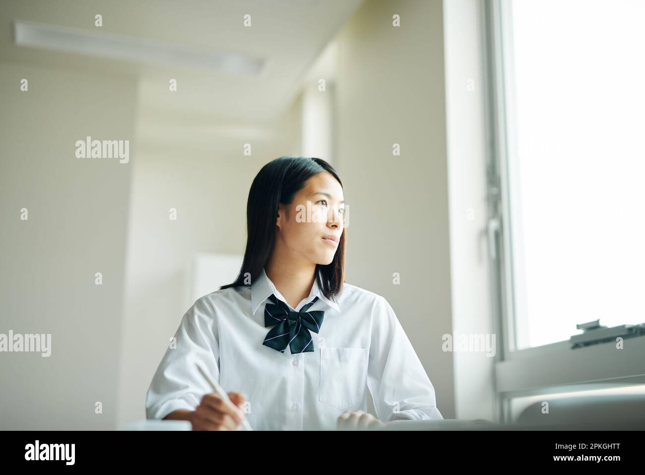 High school girls studying in a classroom Stock Photo - Alamy