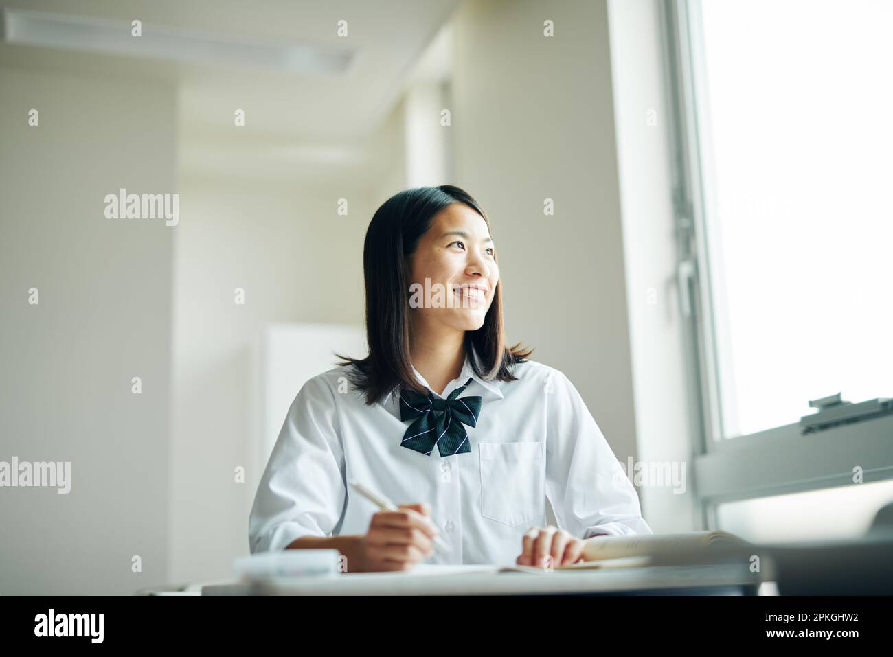 High school girls studying in a classroom Stock Photo - Alamy
