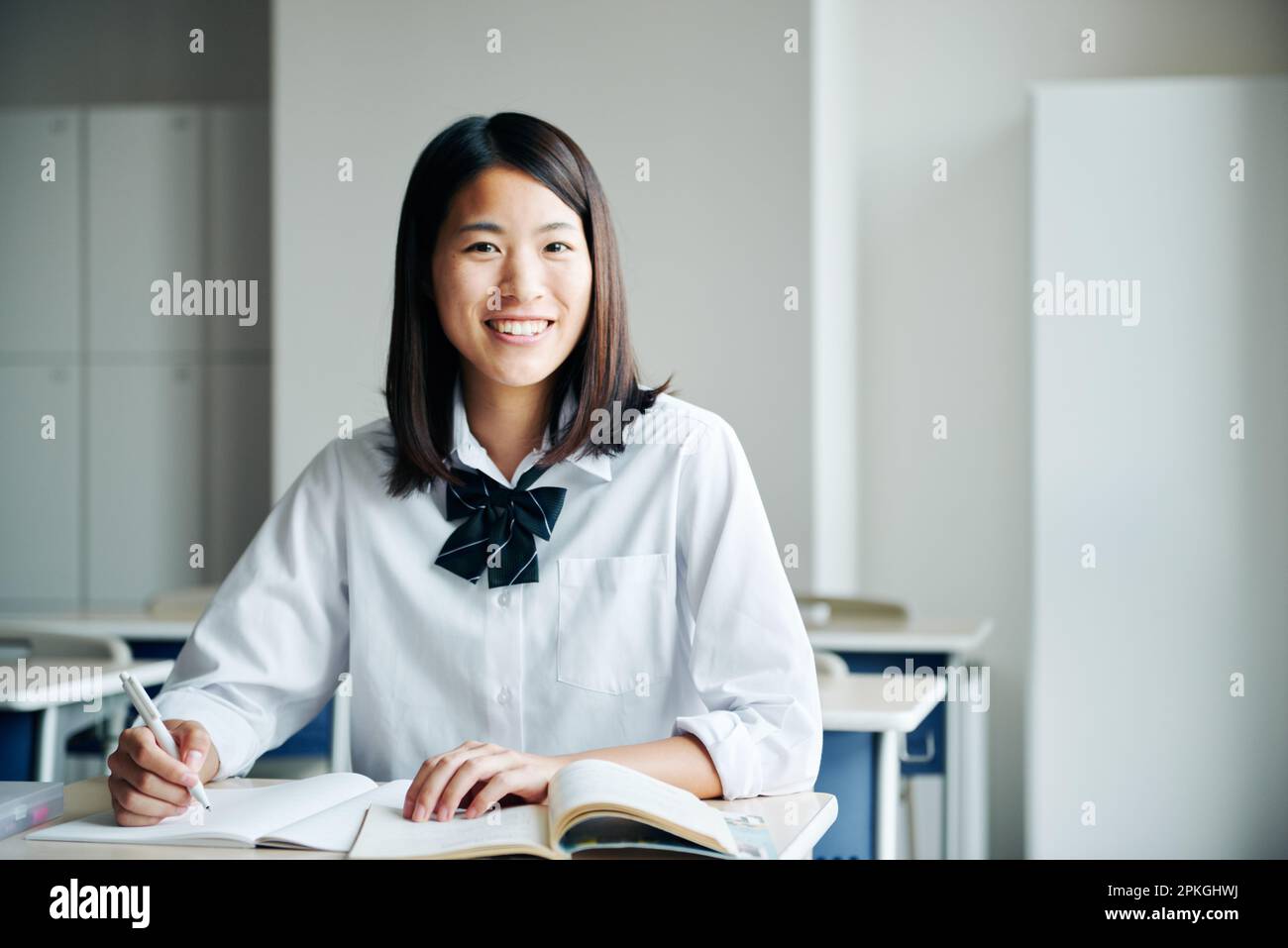 High school girls studying in a classroom Stock Photo - Alamy