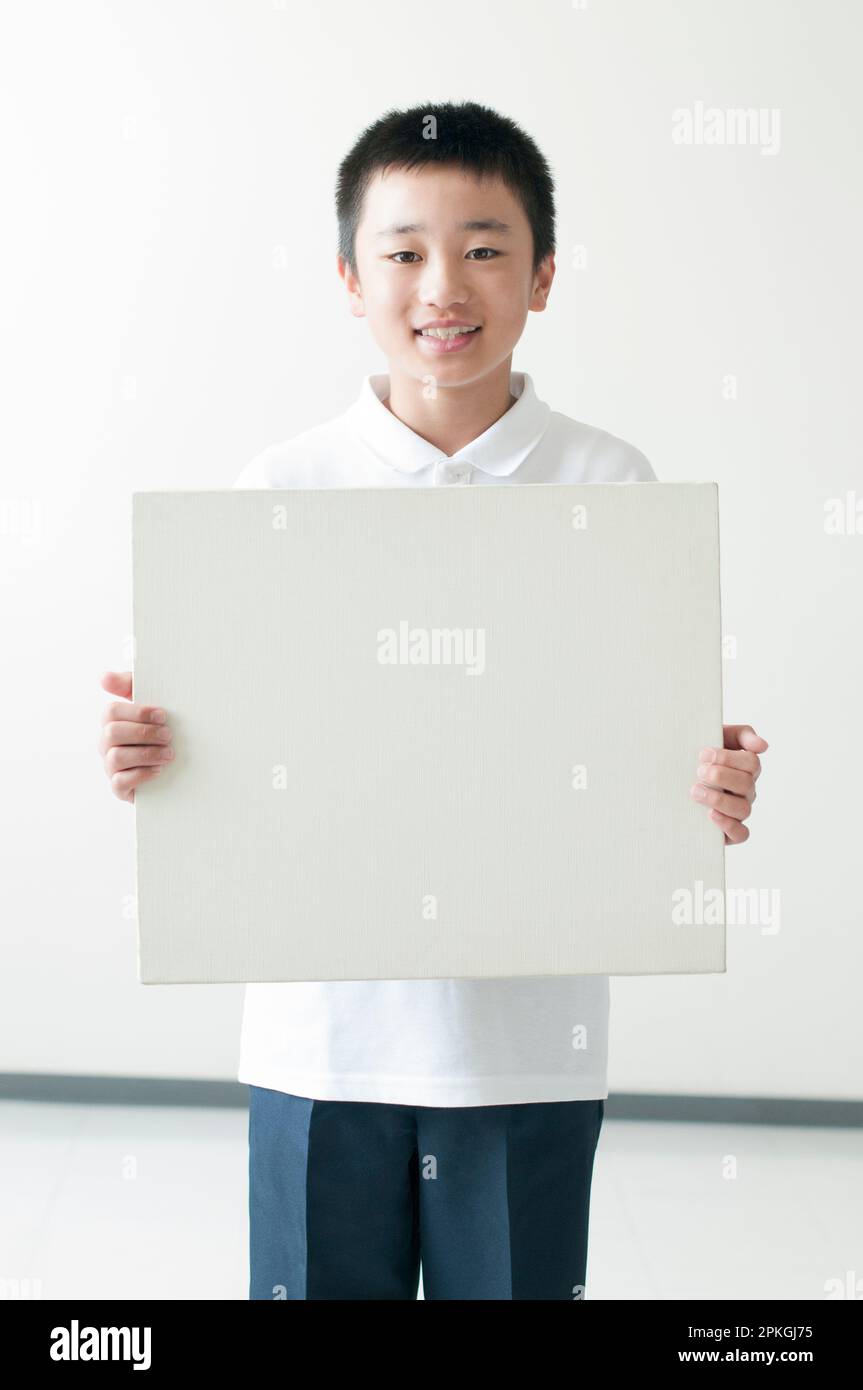 Boy with photo show and tell hi-res stock photography and images - Alamy