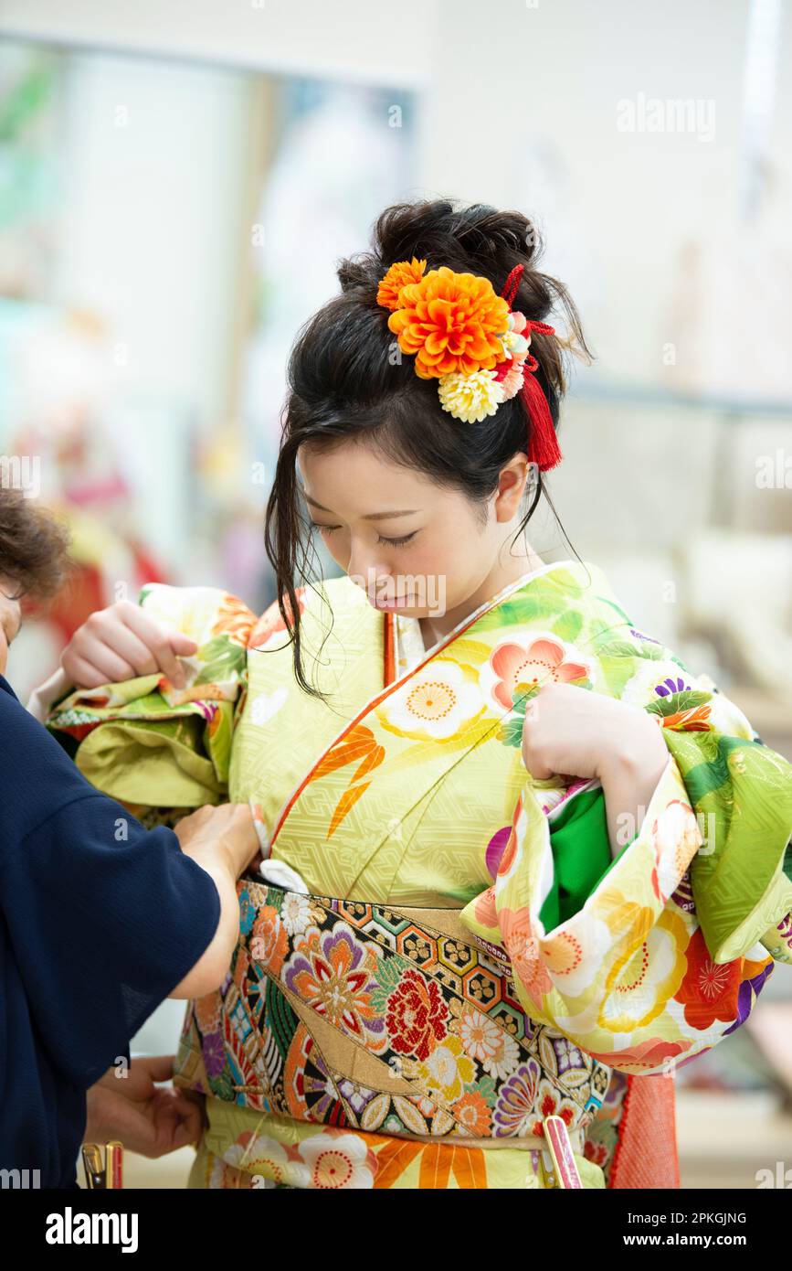 Woman getting dressed hi-res stock photography and images - Alamy