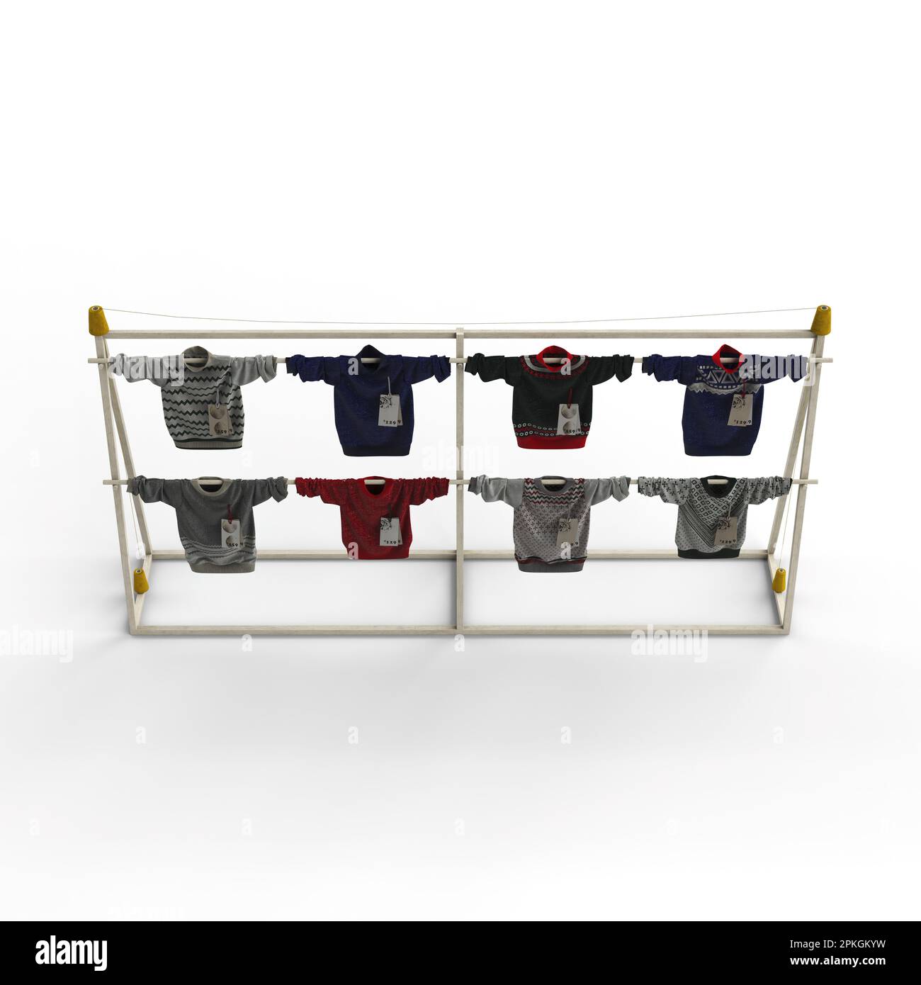 A clothing rack with multiple sweaters hanging from it on a white ...