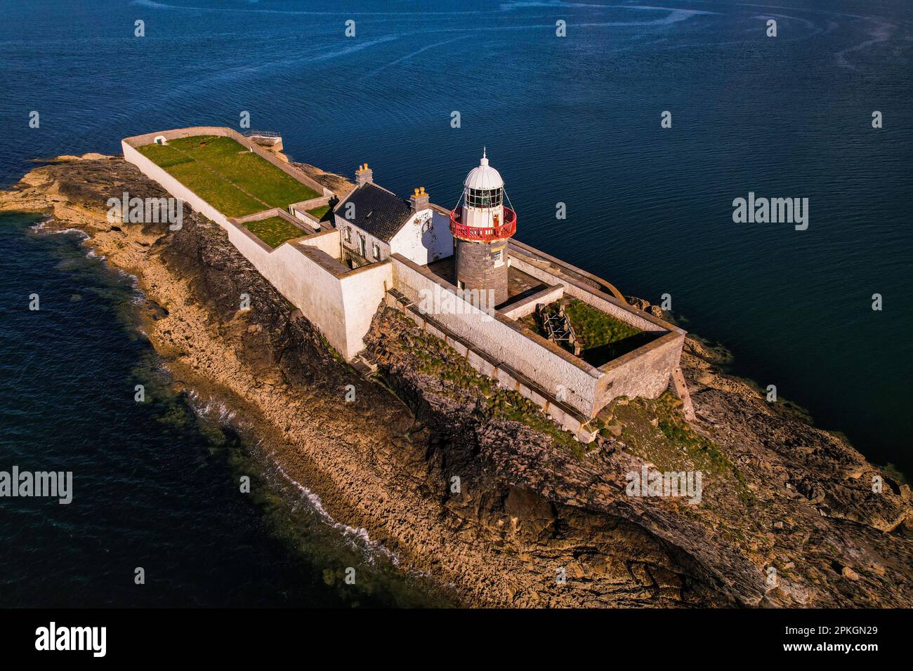 AStill image of an aerial view of the historic Fenit Lighthouse on ...