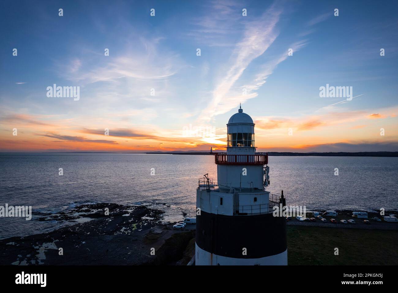 Aerial view of Hook Lighthouse is a building on Hook Head at the tip of the Hook Peninsula in ...