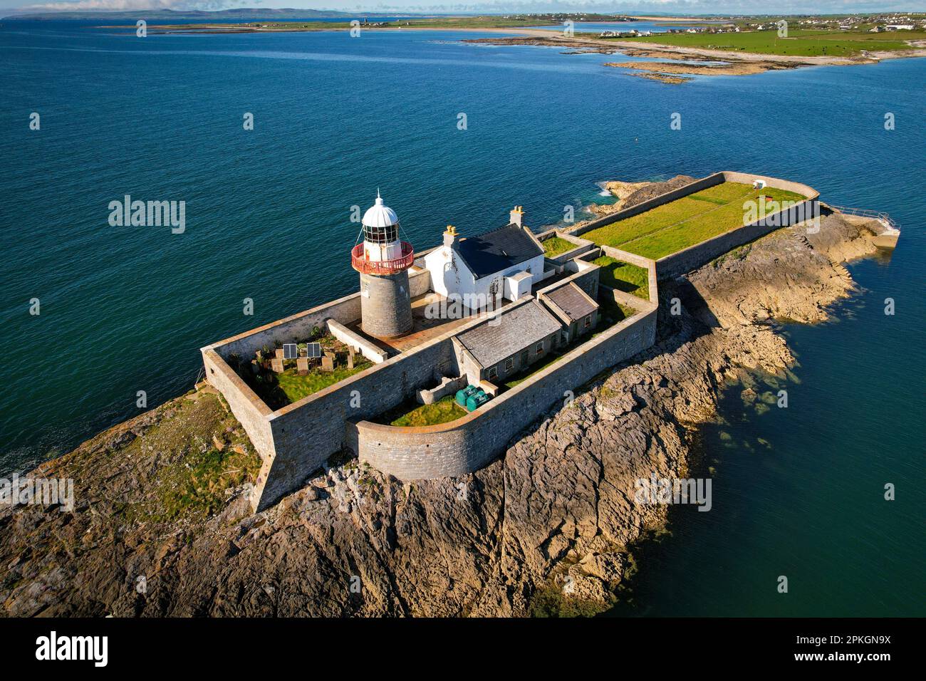 AStill image of an aerial view of the historic Fenit Lighthouse on ...