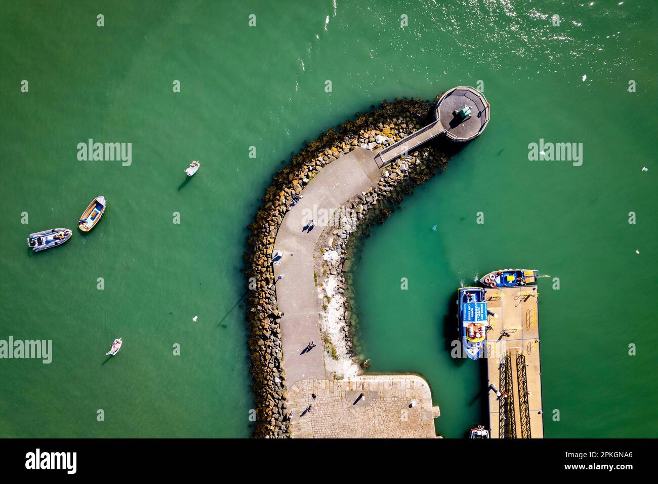 Top-down aerial image of Howth Harbor pier during a sunny day with ...