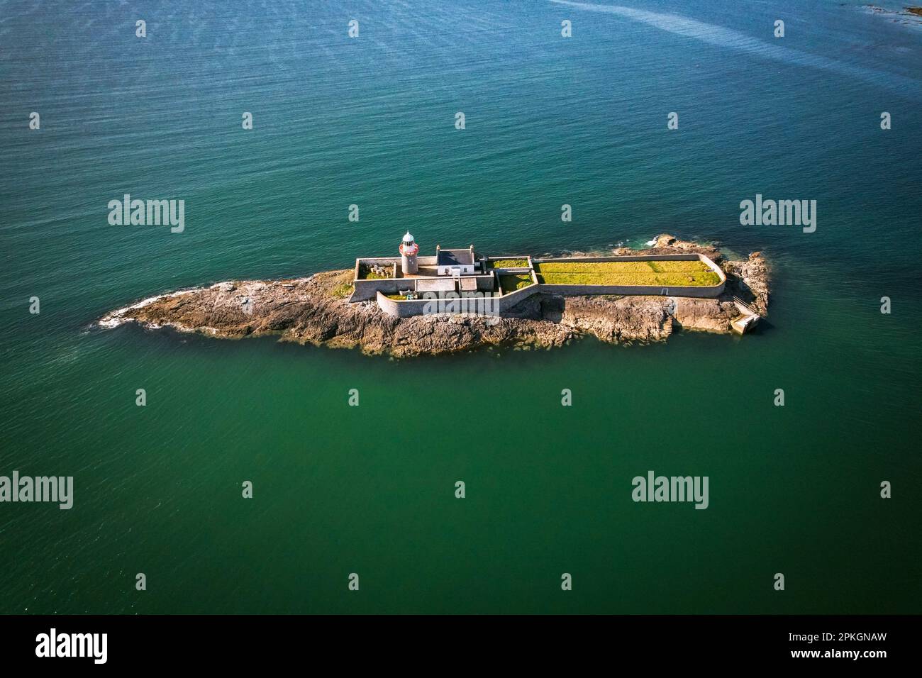 AStill image of an aerial view of the historic Fenit Lighthouse on ...