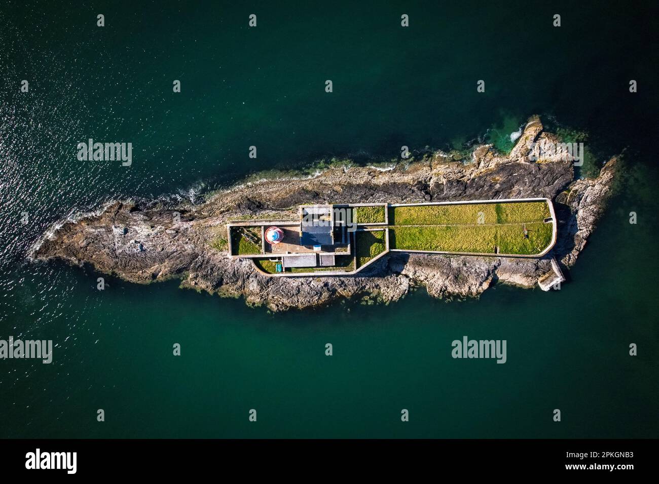 AStill image of an aerial view of the historic Fenit Lighthouse on ...