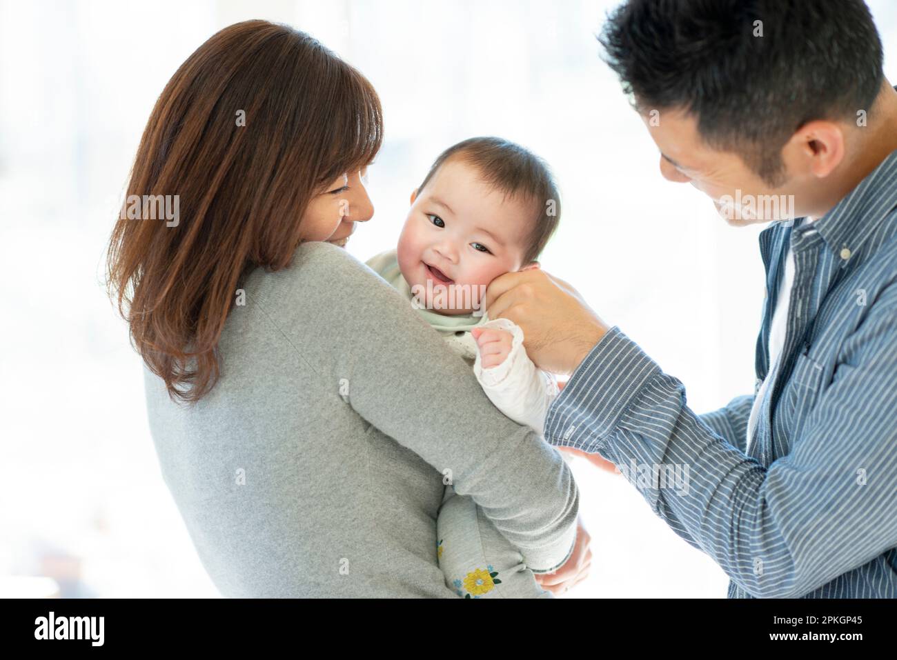 Old woman watching family leave hi-res stock photography and images - Alamy