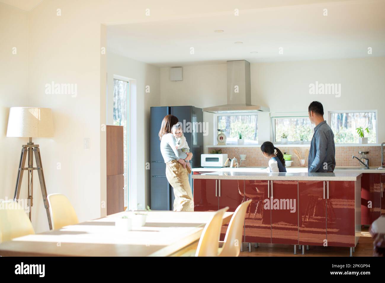 Old woman watching family leave hi-res stock photography and images - Alamy