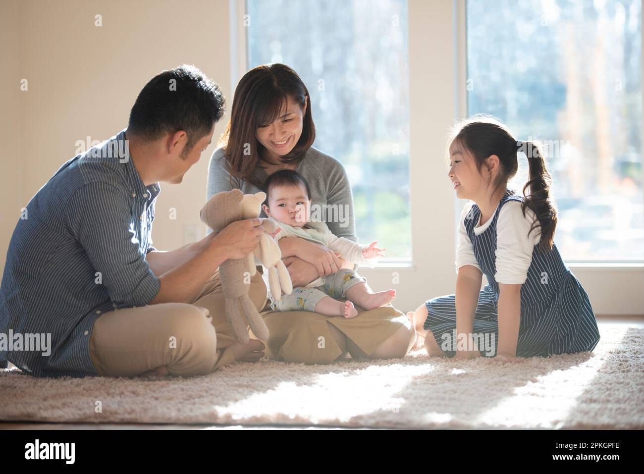 Baby and parents work photo hi-res stock photography and images - Alamy